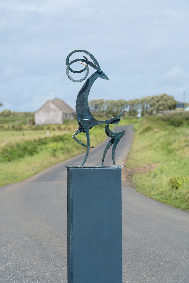 Tall Bronze Goat (Green) by sculptor Seamus Connolly